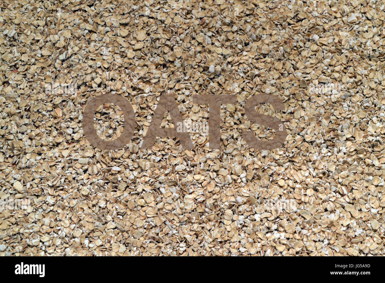 Steel rolled oats with transparent text over top Stock Photo - Alamy