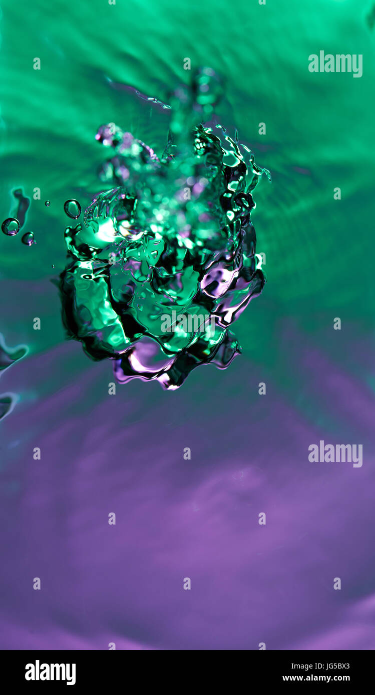 Abstract shape of water splash on colorful water surface background ...