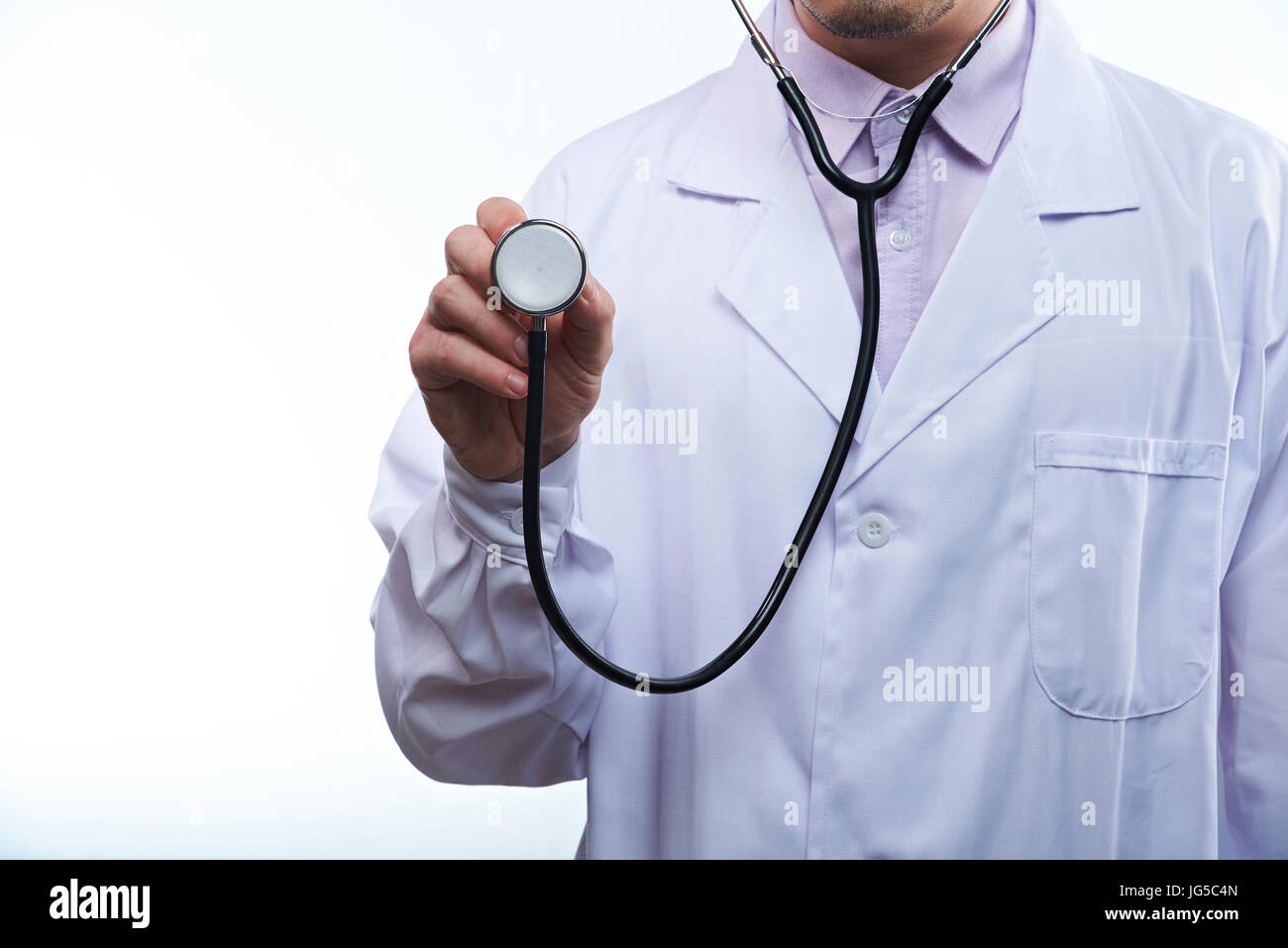 Doctor with stethoscope in hand closeup. Professional doc in uniform ...