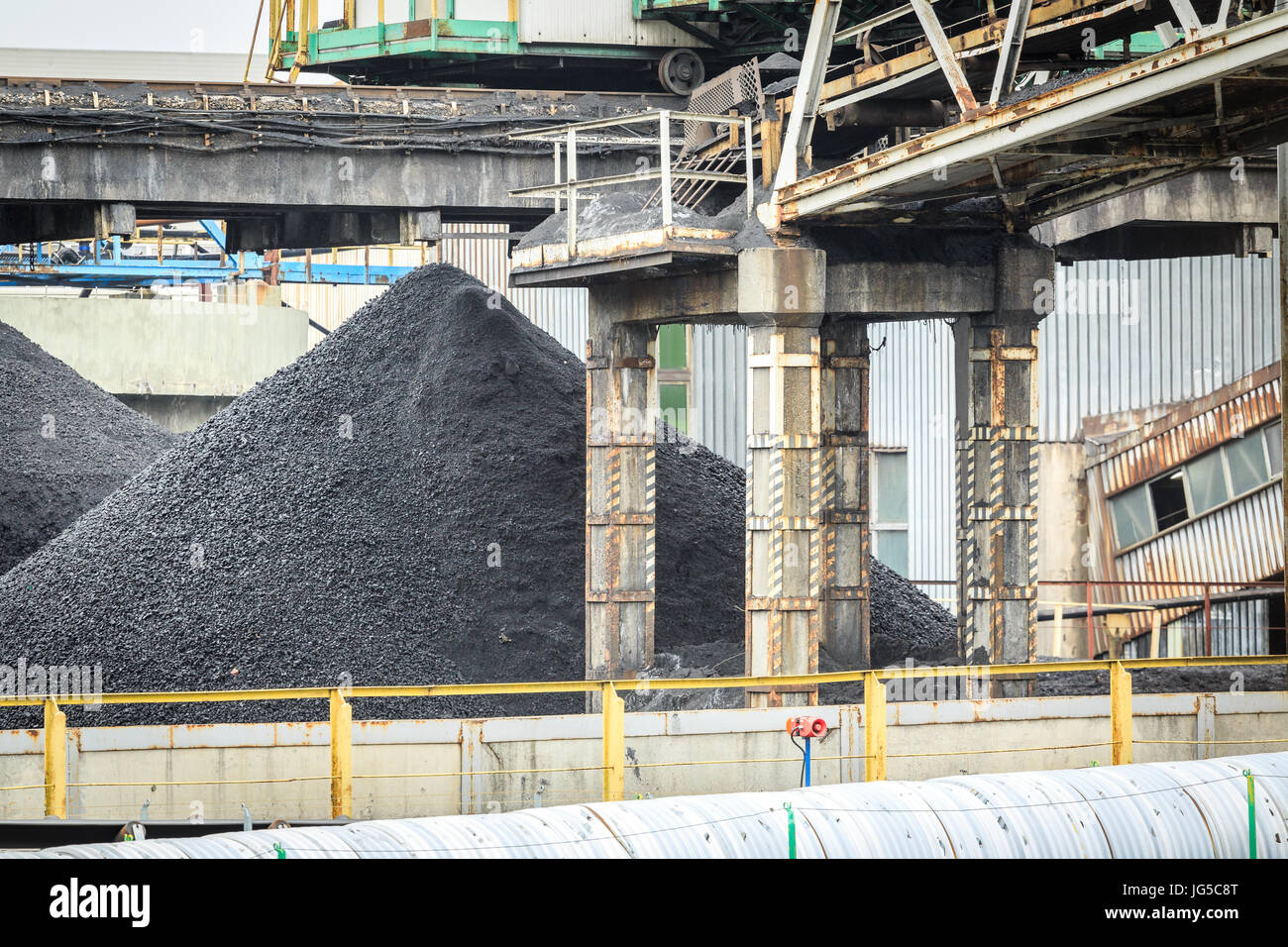 Heap of coal in the mine among mining infrastructure, Silesia Region ...