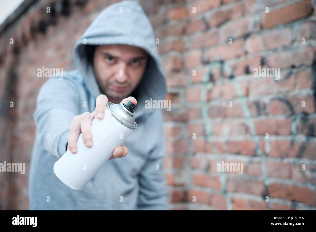 Graffiti wall spray man hi-res stock photography and images - Alamy