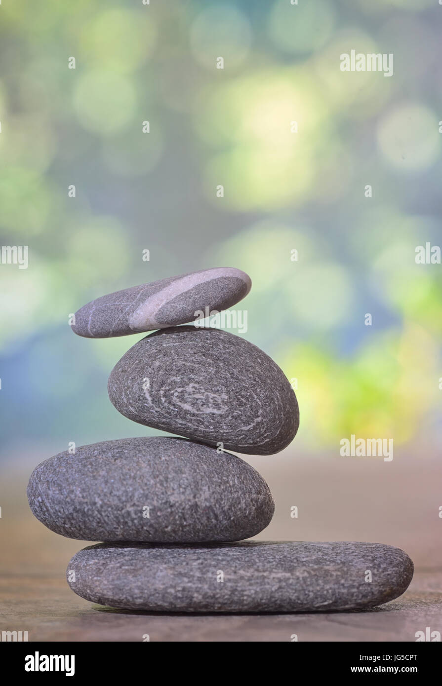 pile of pebble stones isolated in nature Stock Photo - Alamy