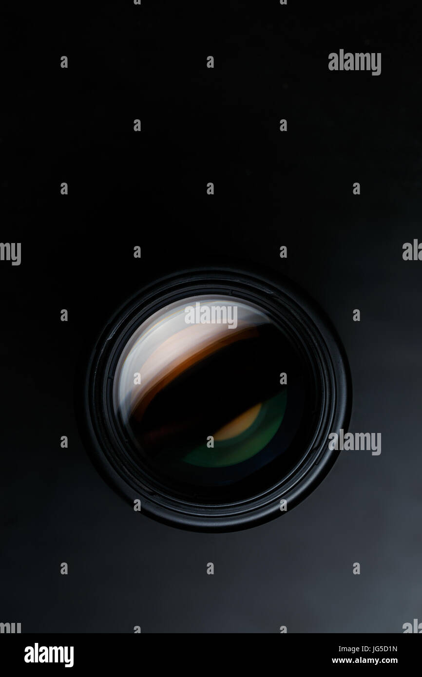 Camera lens on empty background Stock Photo - Alamy