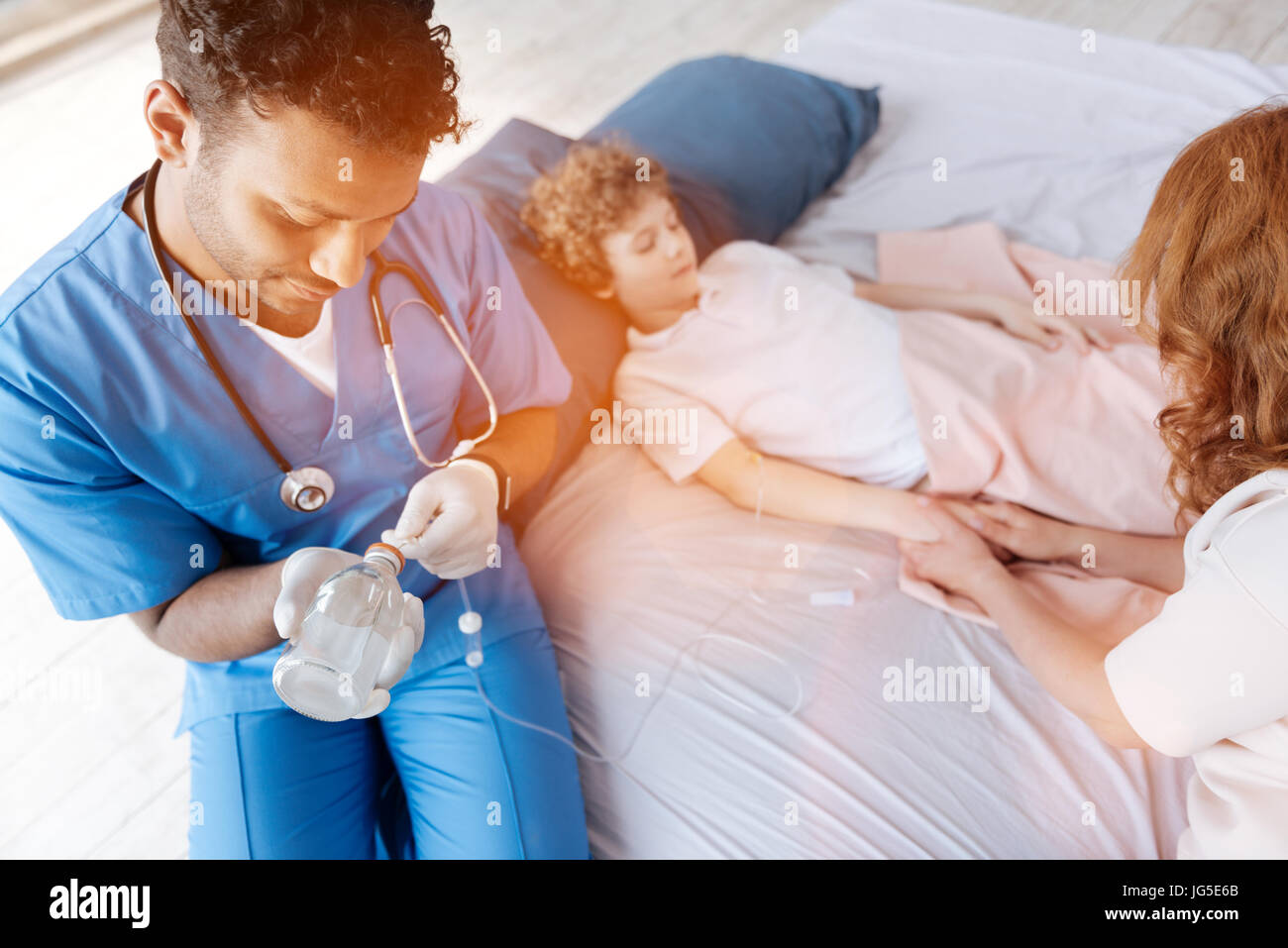 Sick kid comfort hi-res stock photography and images - Alamy