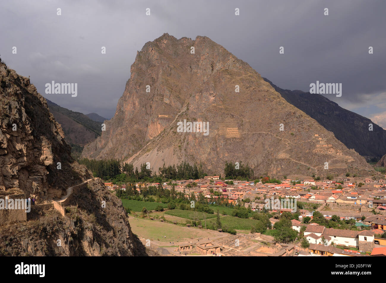 Above the town of Ollantaytambo tower the well-preserved remains of a ...