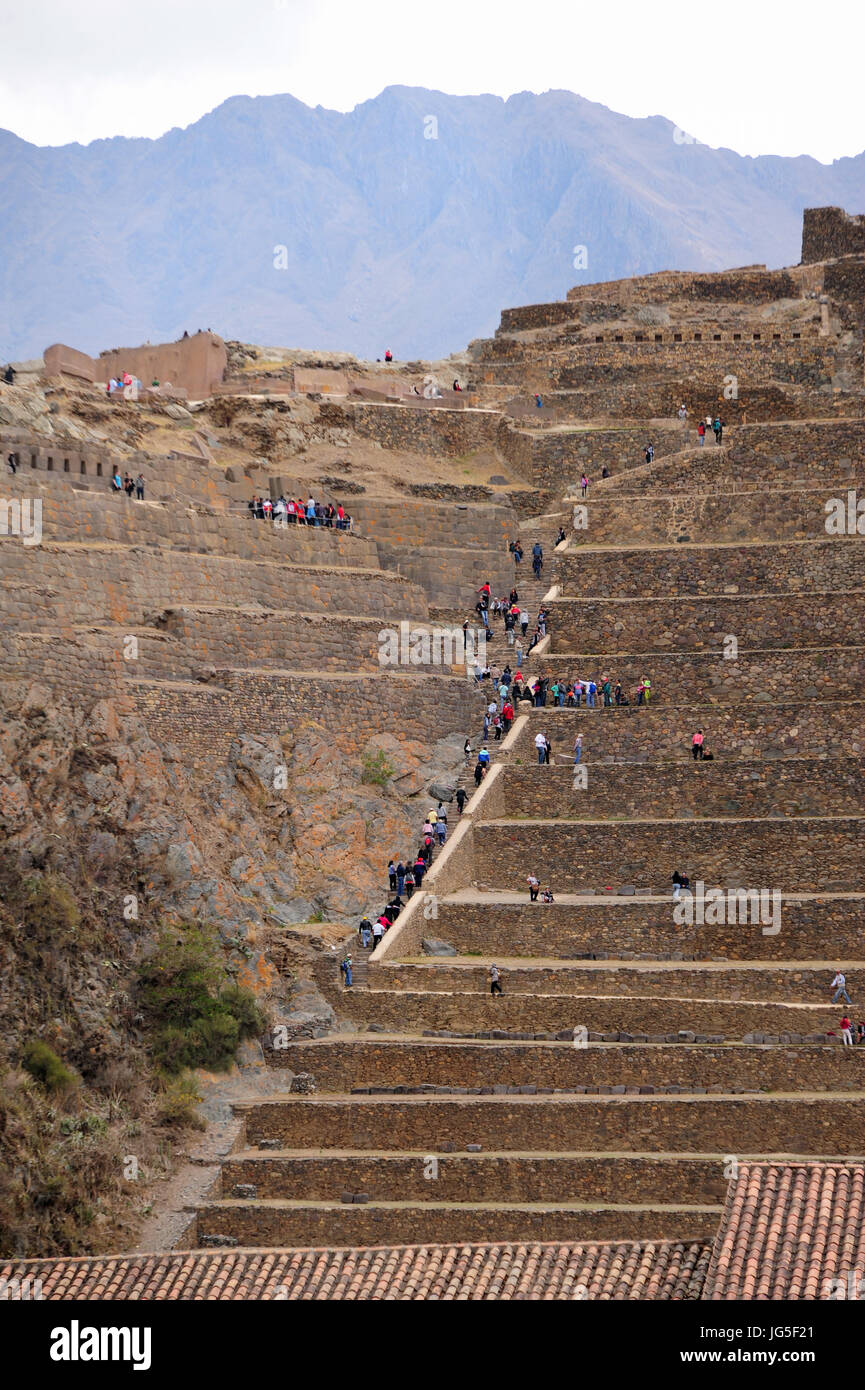 Above the town of Ollantaytambo tower the well-preserved remains of a ...