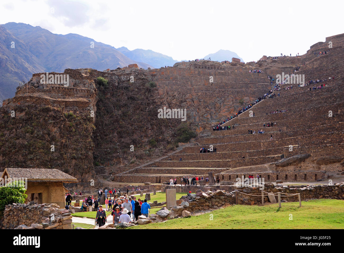 Above the town of Ollantaytambo tower the well-preserved remains of the ...