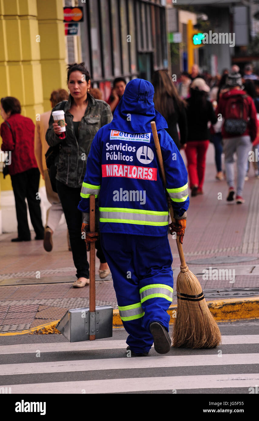 Street-cleaners going about their work in the Lima (Peru's capital ...