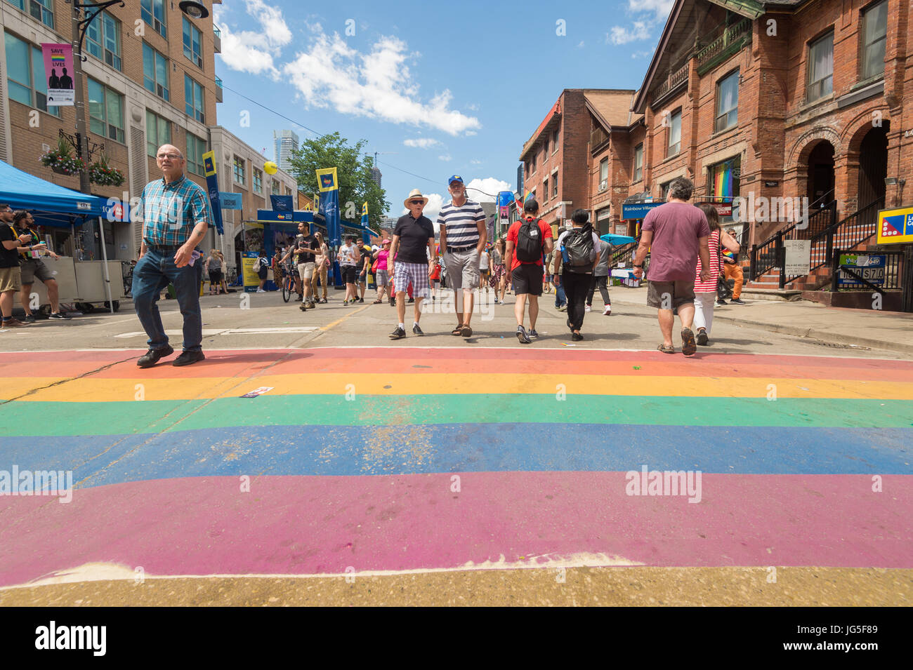 Toronto, CA - 24 June 2017: Gay Rainbow Flag painted on asphalt in ...