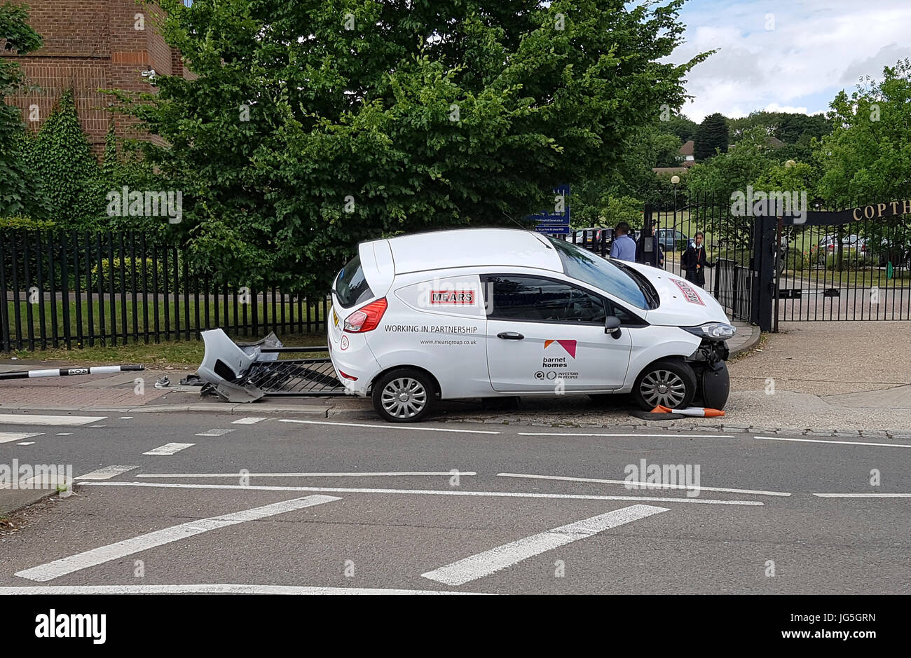 Van crashes outside London school Stock Photo - Alamy
