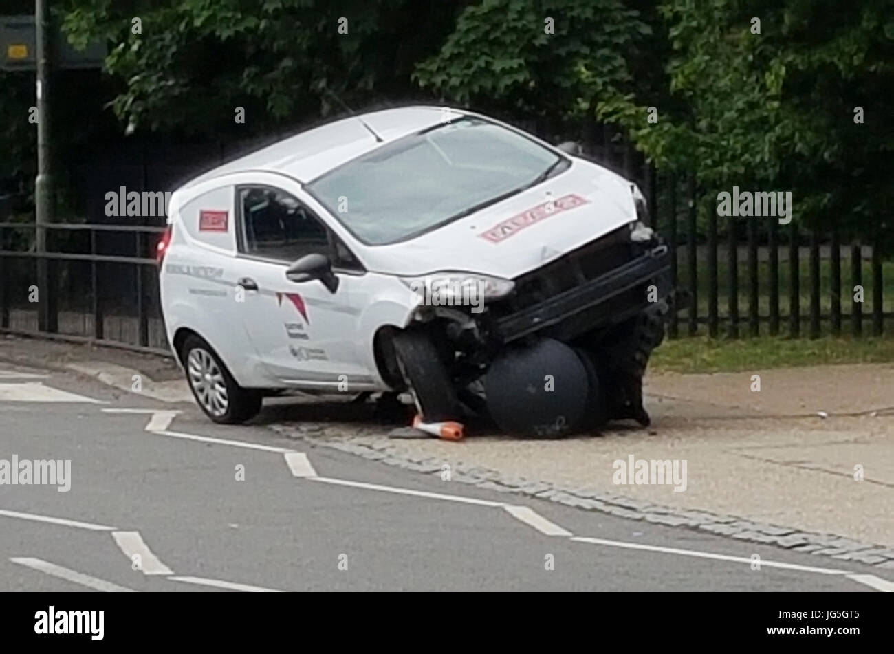 Van crashes outside London school Stock Photo - Alamy