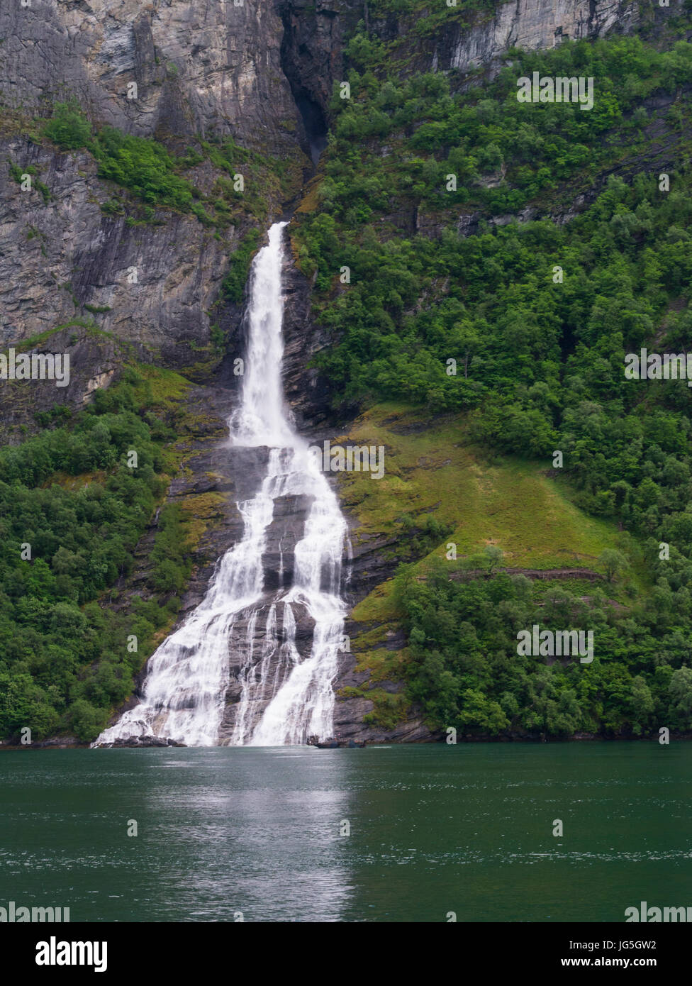 The Suitor opposite the Seven Sisters waterfall flows into ...