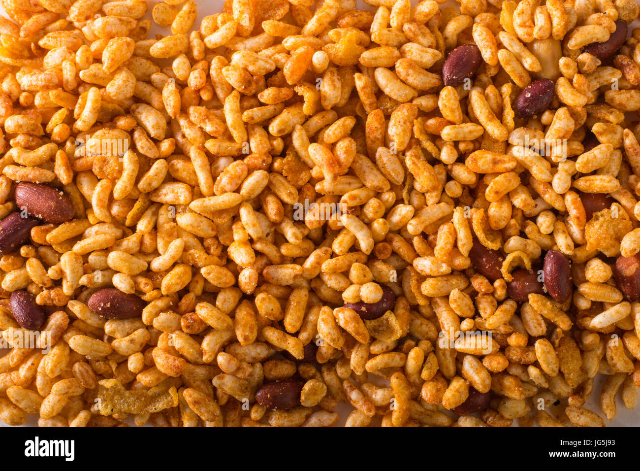 Bhadang (Puffed rice chivda) spread over table top Stock Photo - Alamy