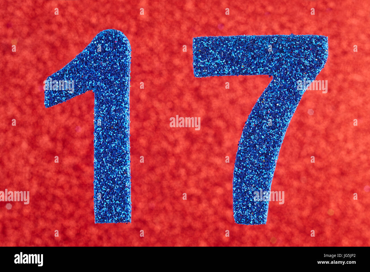 Number seventeen blue color over a red background. Anniversary ...