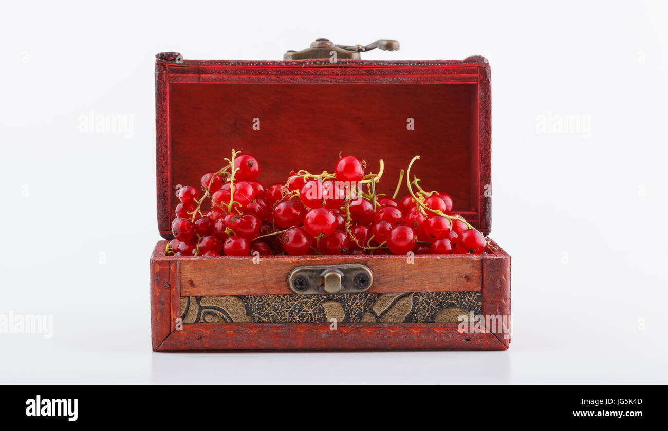 Red currant background, placed in a handmade wooden chest box Stock ...