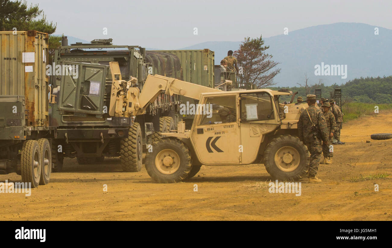 Marines from MWSS 171 at MCAS Iwakuni prepare and load supplies and ...