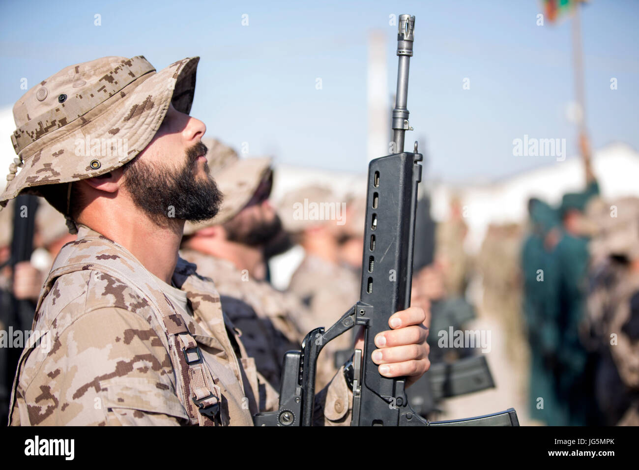 A Spanish army soldier holds a G36 rifle at attention during a ceremony ...