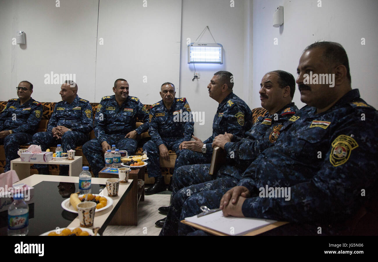 Iraqi Federal Police conduct an operational brief at a patrol base in ...