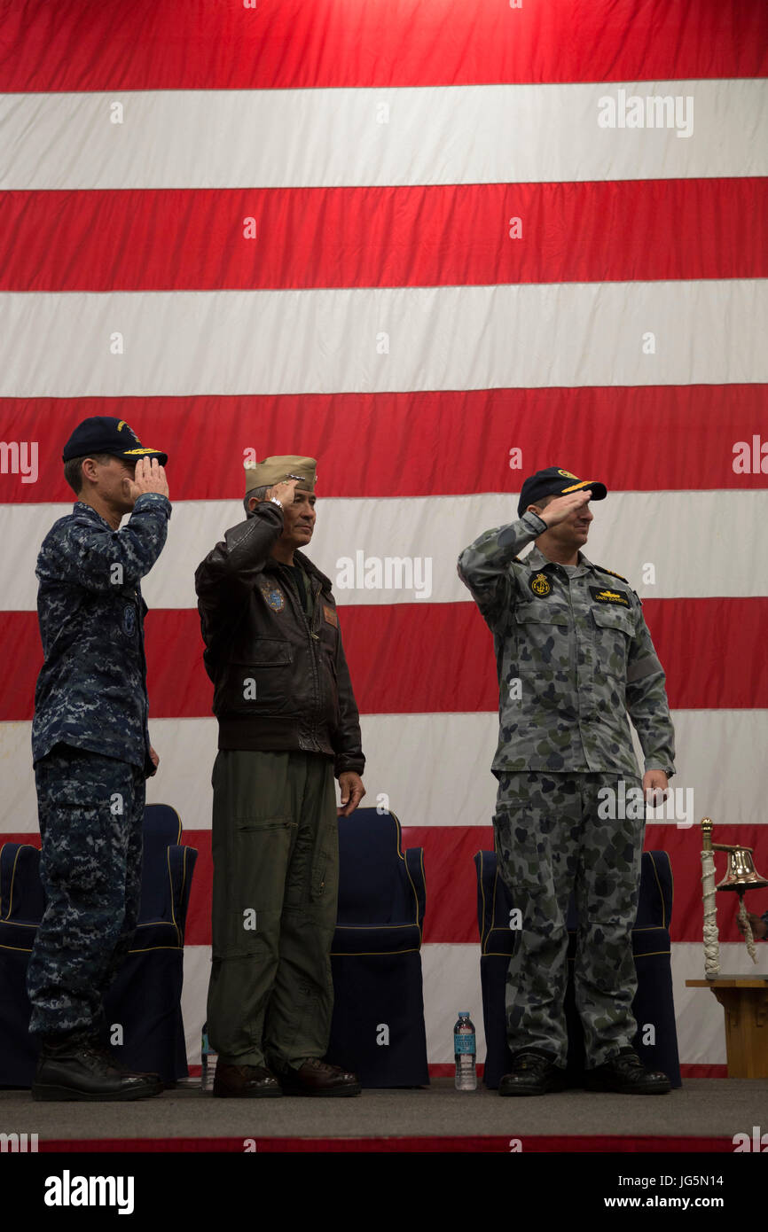 Rear Adm. Marc Dalton, the commander of CTF 76 (left), Adm. Harry ...