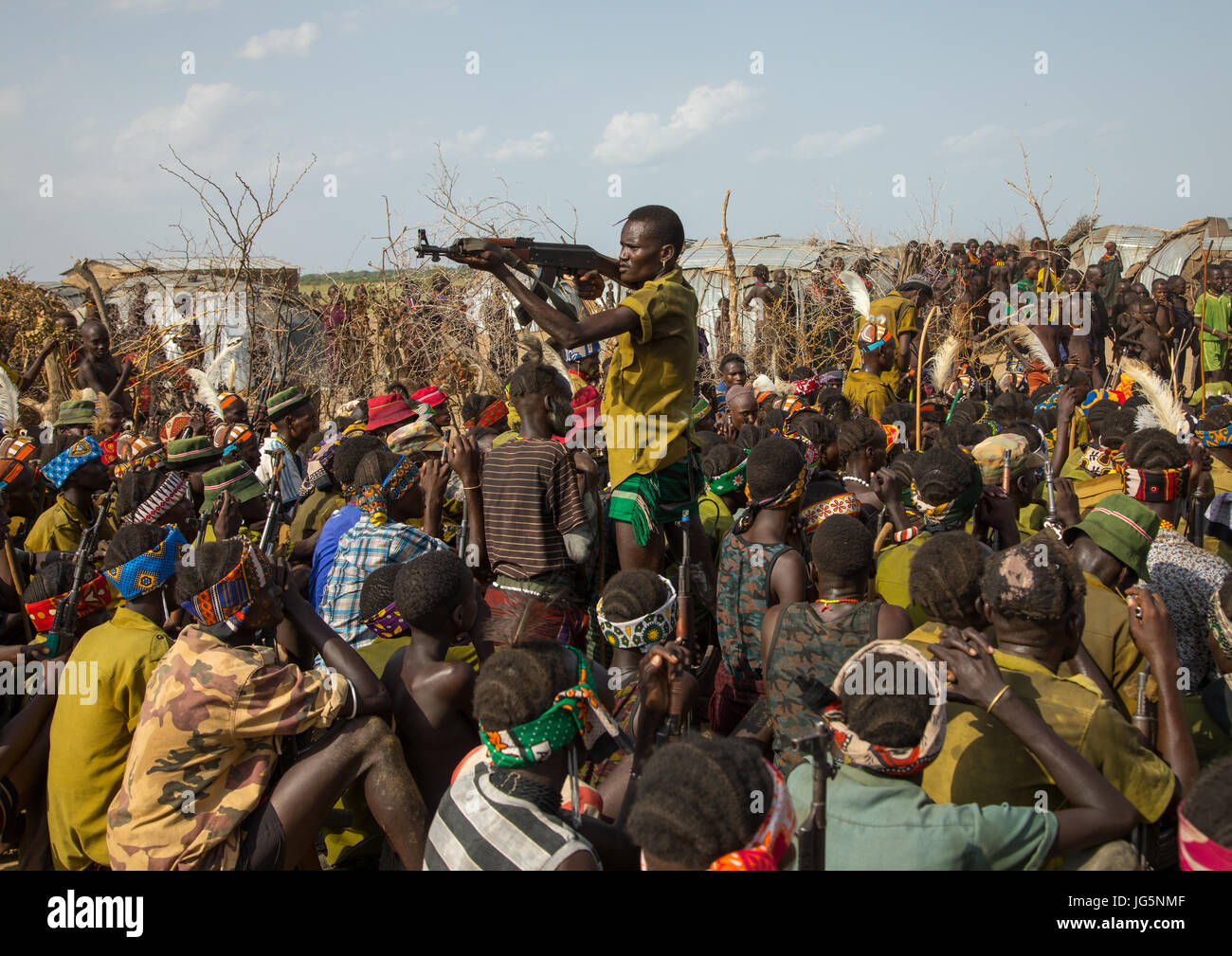 Man shooting with a kalashnikov during the proud ox ceremony in the ...