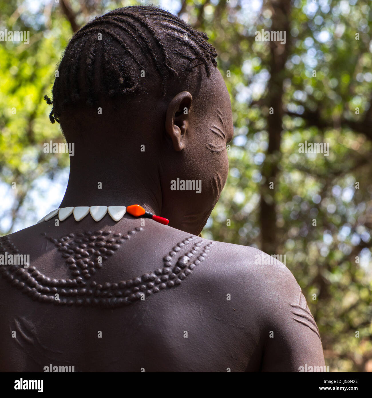 Sudanese Toposa tribe woman refugee with scarifications on her body ...