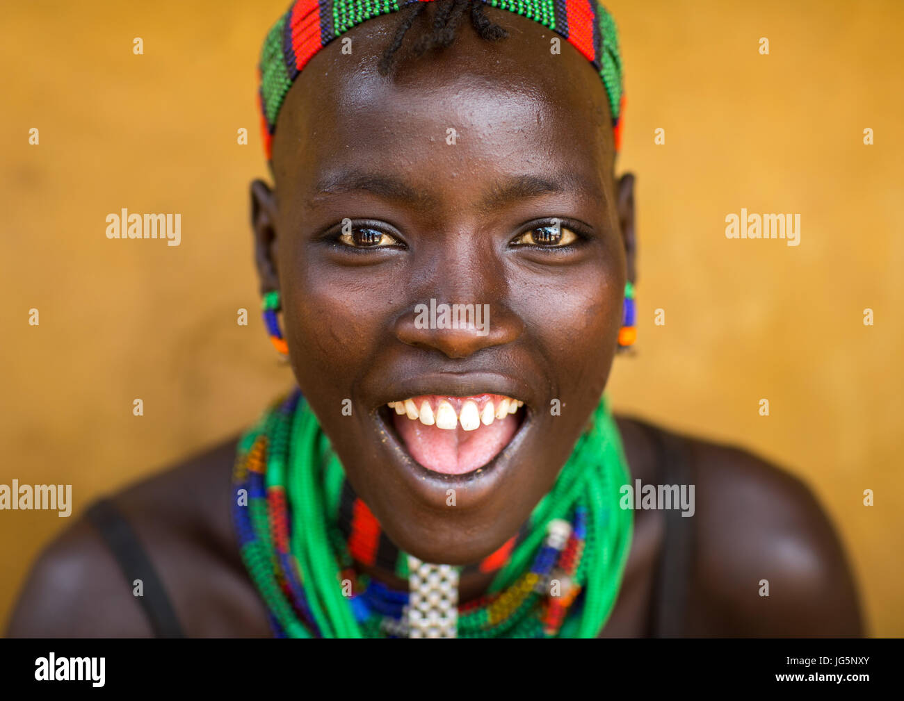 Portrait of a beautiful smiling Hamer tribe woman, Omo valley, Dimeka ...