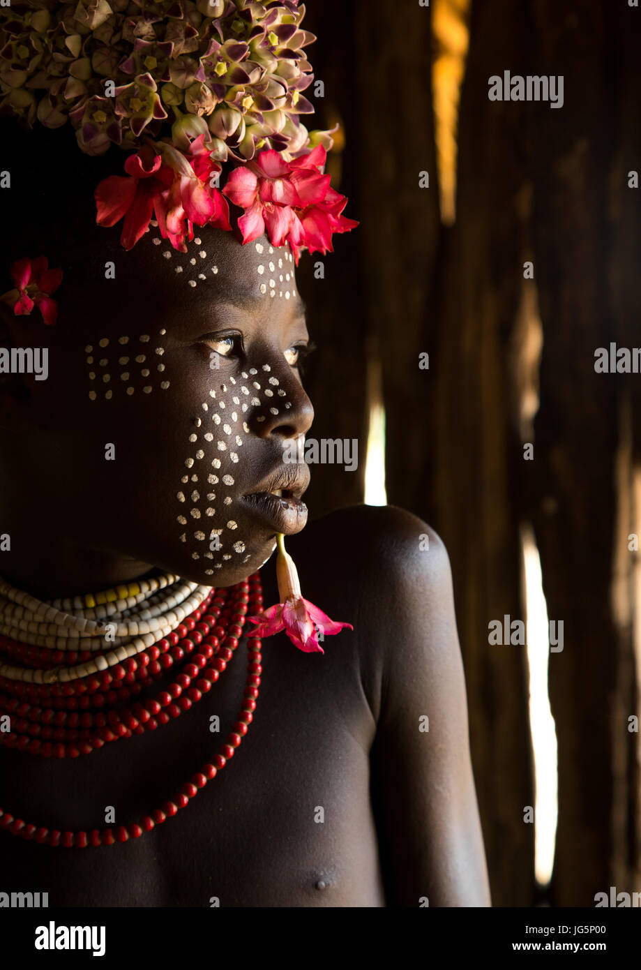 Karo tribe child with flowers decorations, Omo valley, Korcho, Ethiopia ...