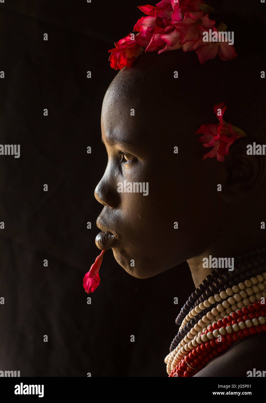 Karo tribe child with flowers decorations, Omo valley, Korcho, Ethiopia ...