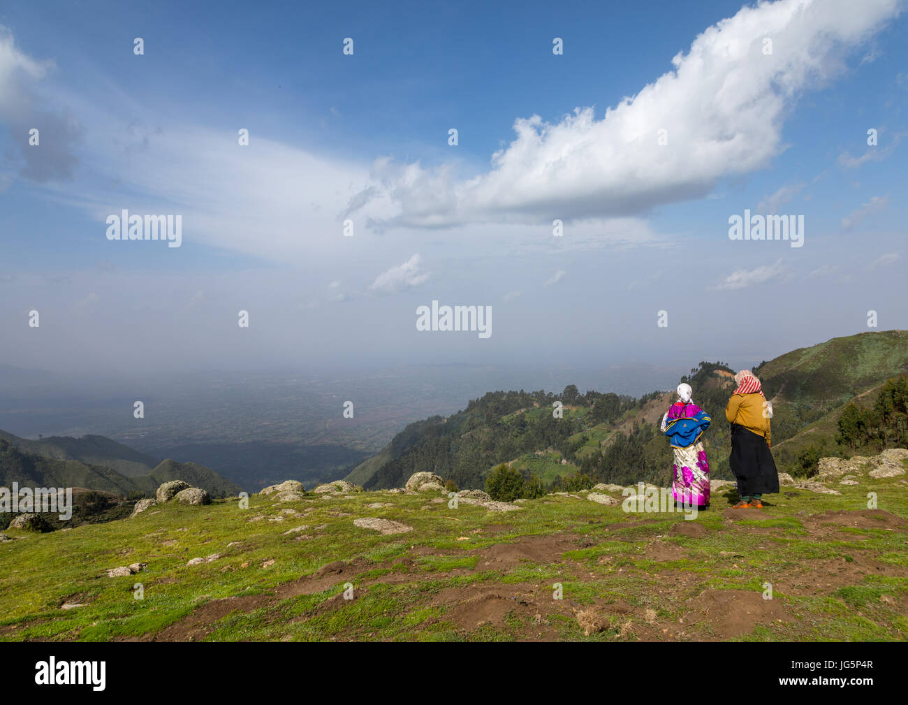 Two Gurage tribe women on a hill looking the valley, Gurage Zone ...
