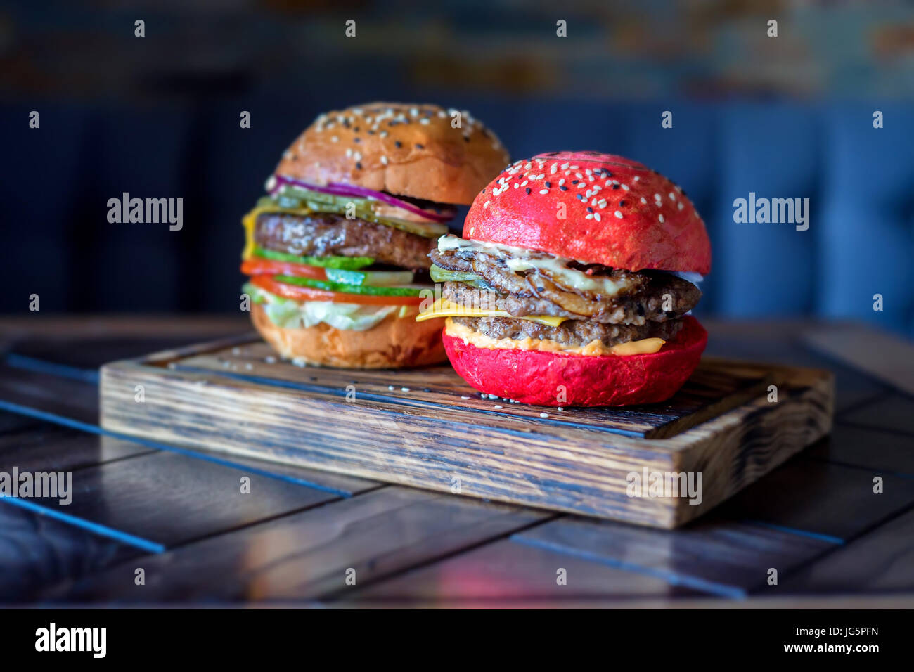 Homemade hamburger with red bun Stock Photo - Alamy