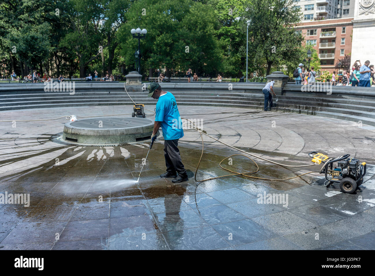 New York, NY, USA - 3 July 2017 - Park workers use a high pressure ...