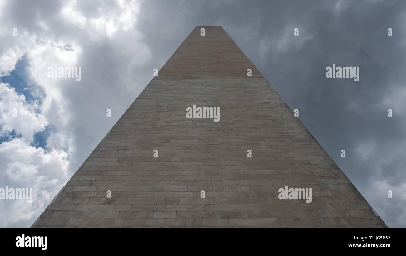 Looking up the Side of the Washington Monument with Rain Clouds behind ...