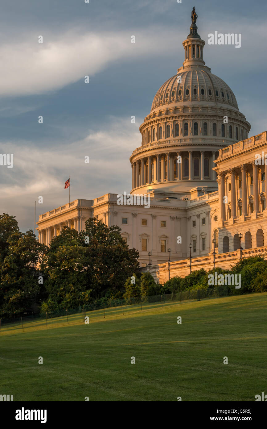 Side View of the US Capitol During Clear Skies and sunset Stock Photo ...