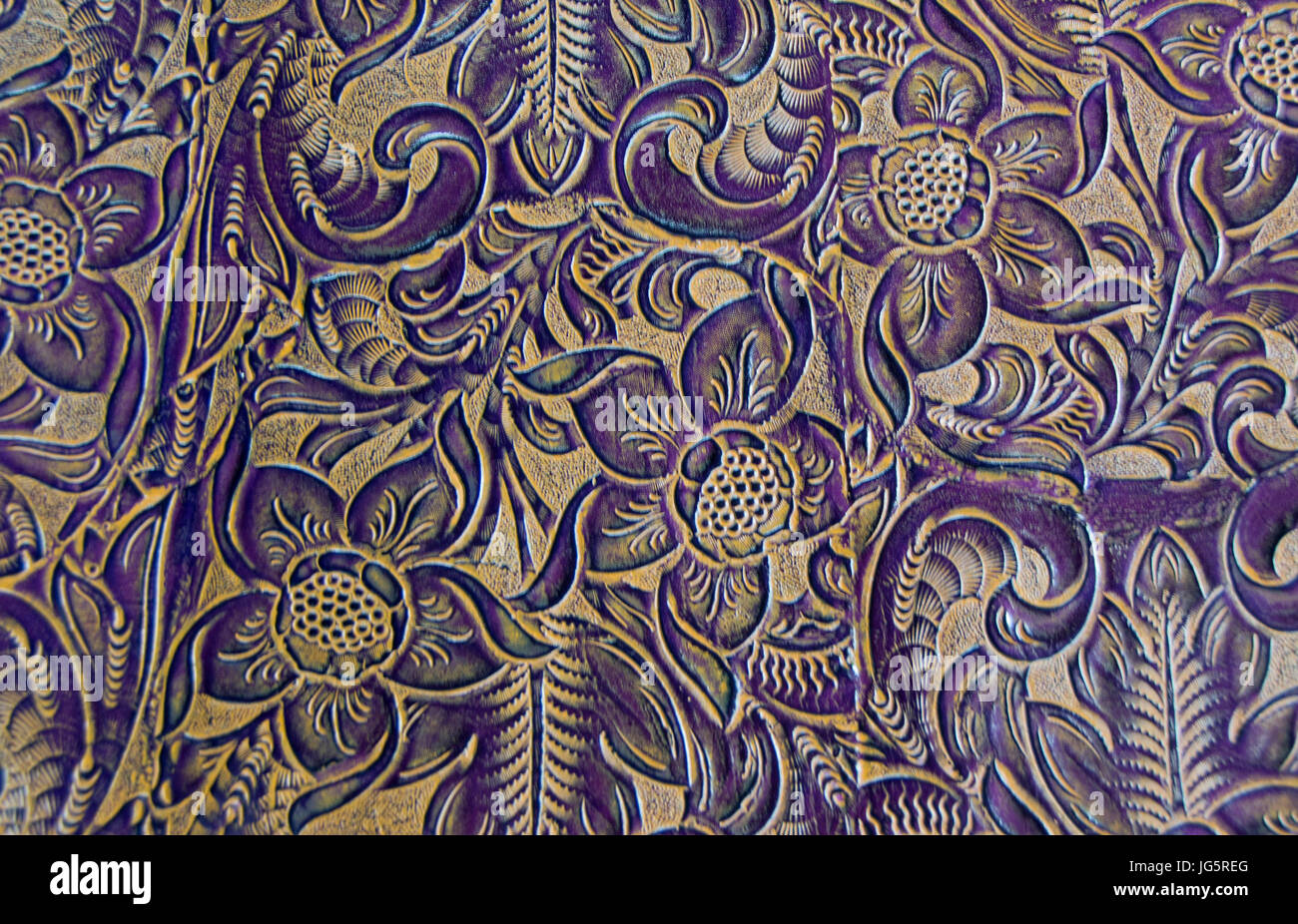 Leather texture. A type of genuine leather with a flower engraving on ...