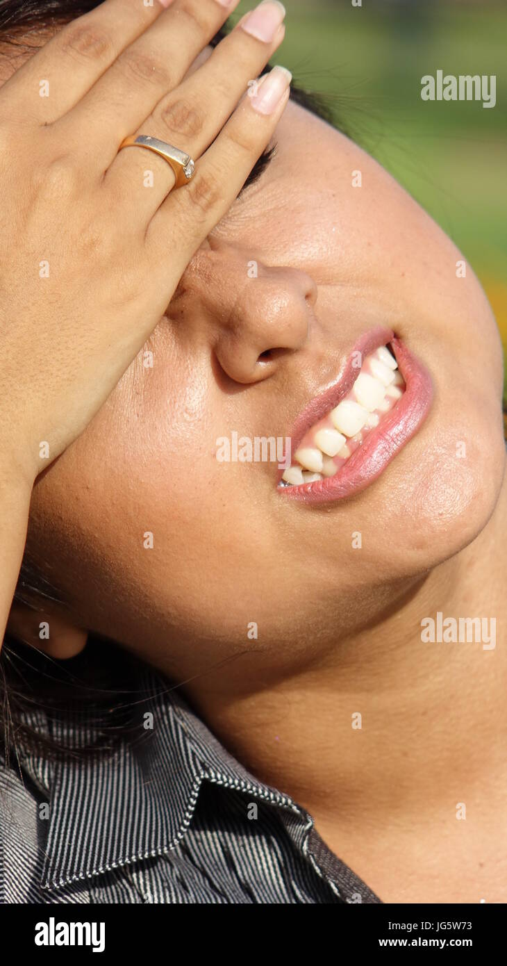 Hispanic Girl With Headache Stock Photo - Alamy