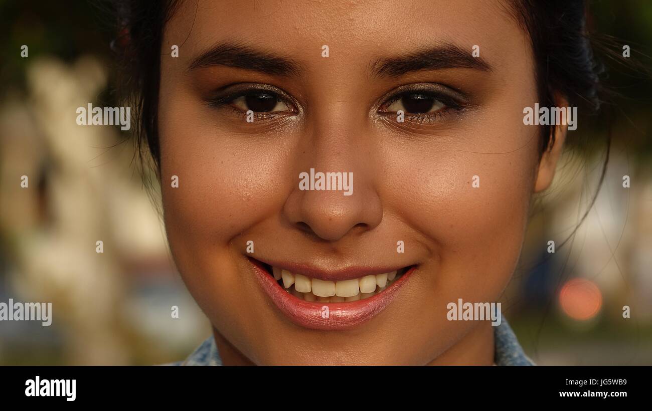 Smiling Face Of Young Person Stock Photo - Alamy