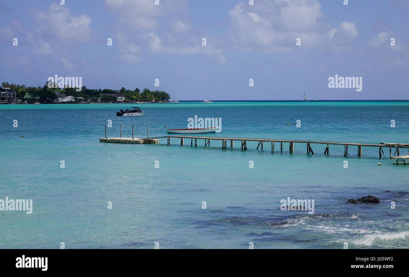 Wooden bridge at jetty in Mauritius. Mauritius is an island nation ...