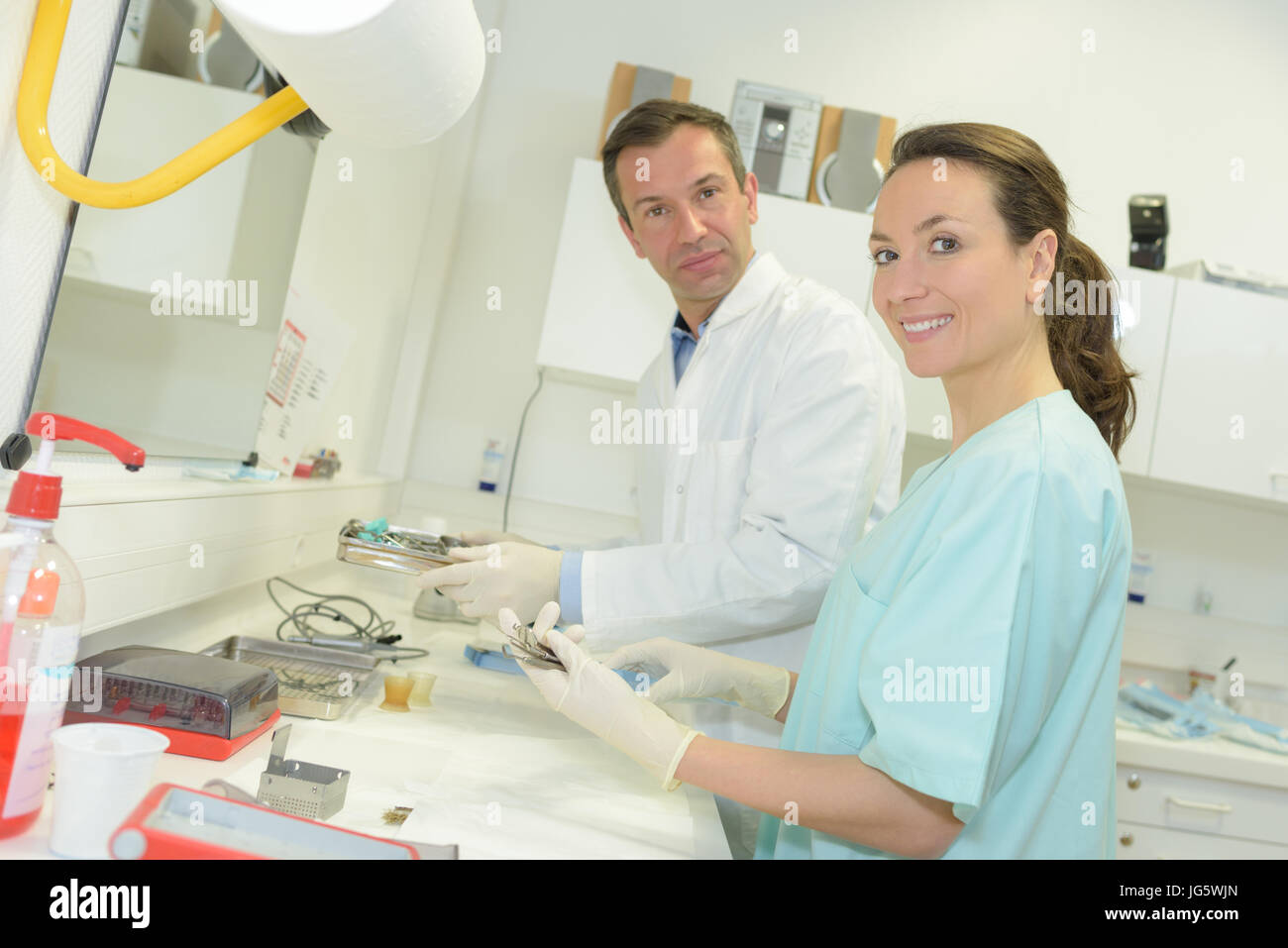 male and female researchers working at laboratory with analysis Stock ...