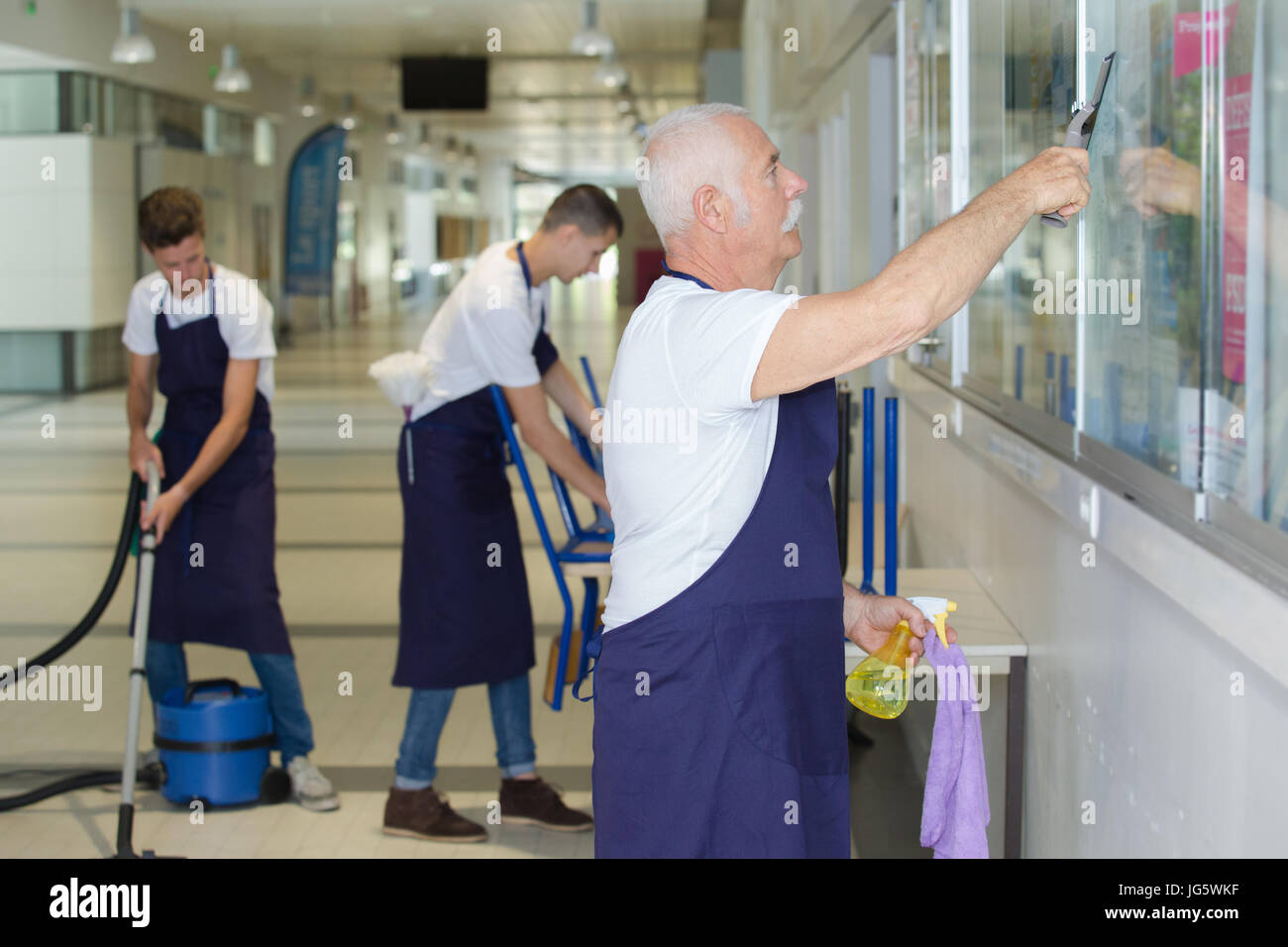 portrait of professional cleaners team at work Stock Photo - Alamy