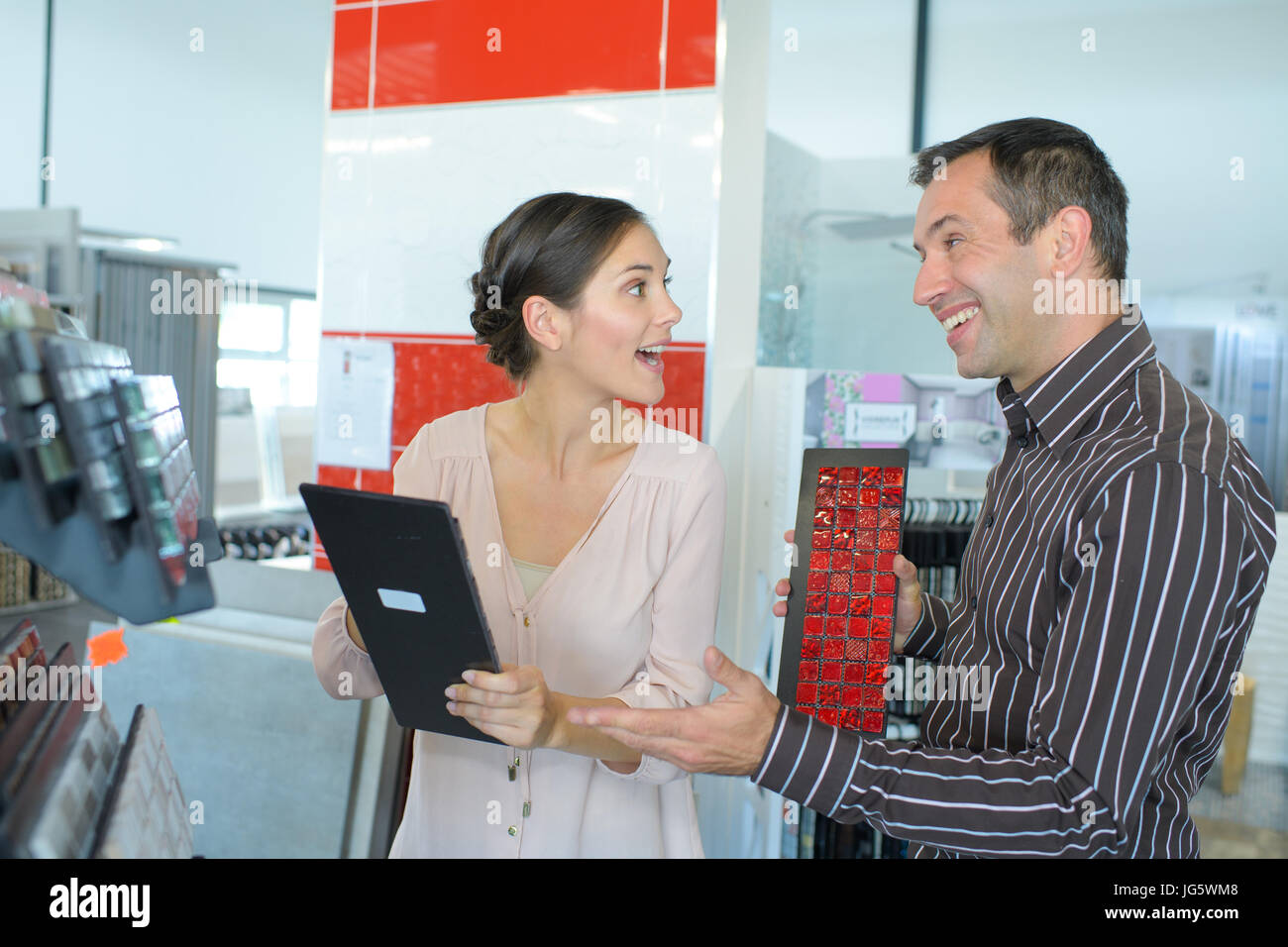 happy couple buying things at hardware store Stock Photo - Alamy