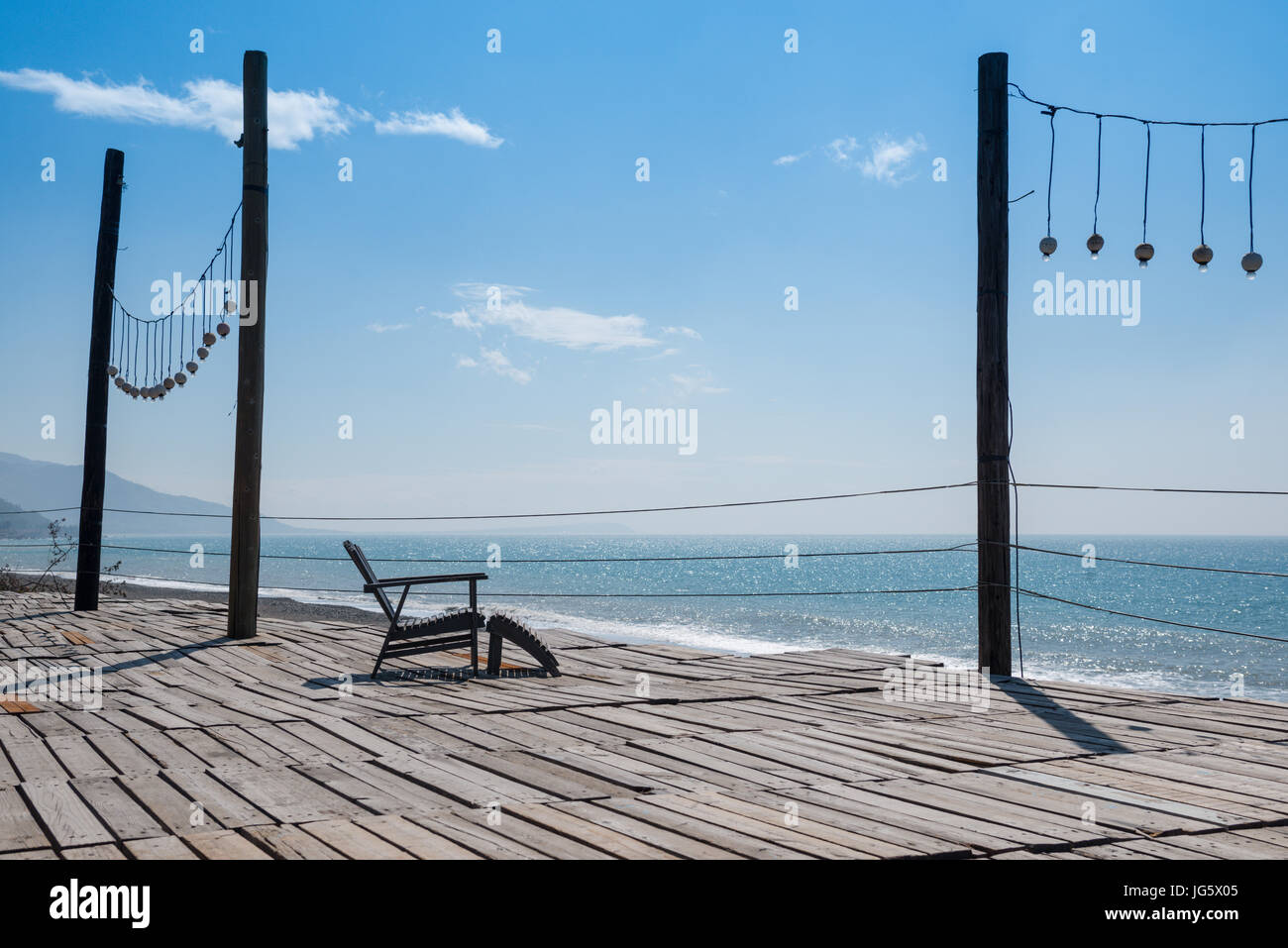 wooden chair on landscape stage with beautiful beach view on tropical ...