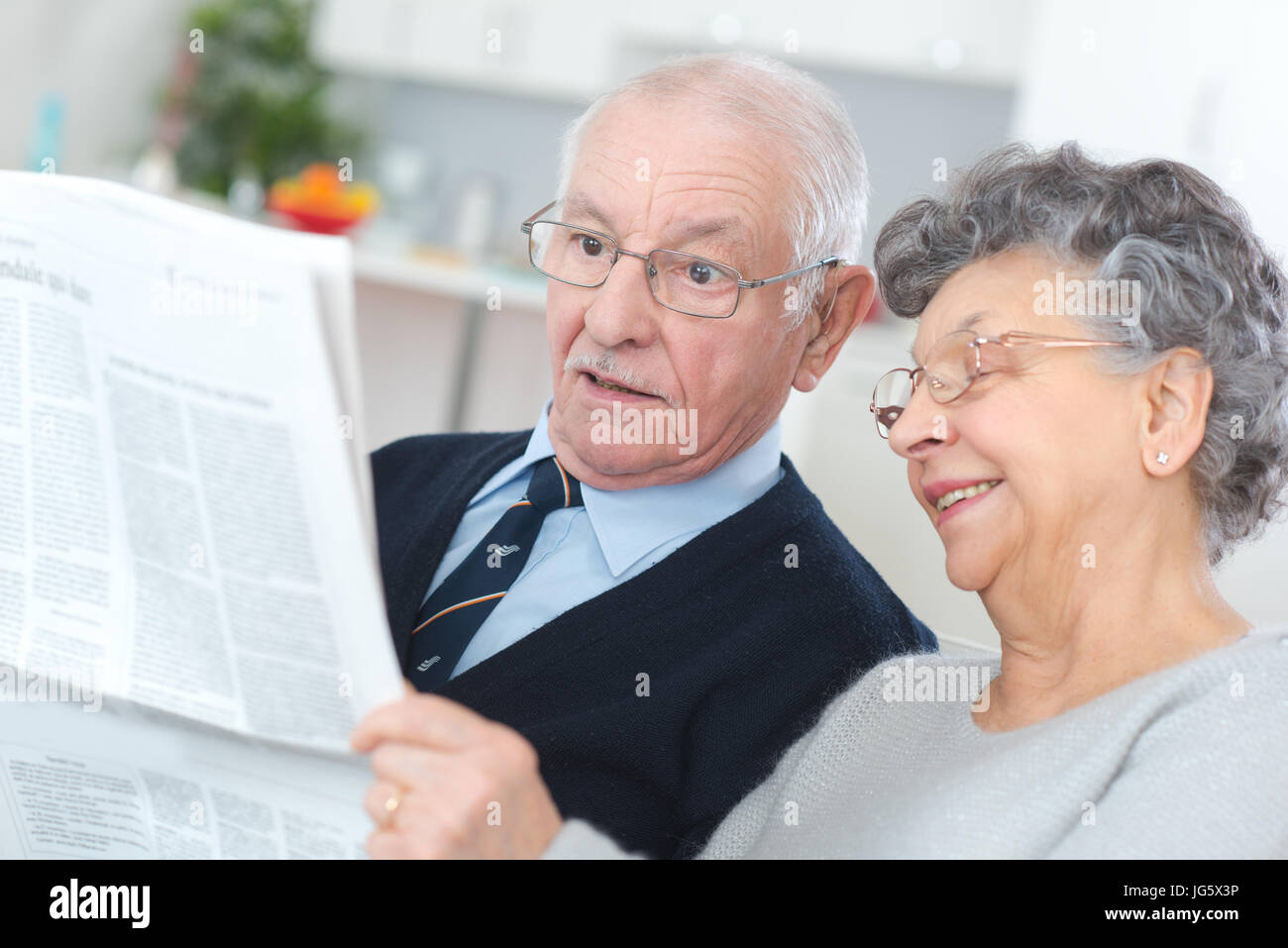 Woman reading weekly newspaper hi-res stock photography and images - Alamy