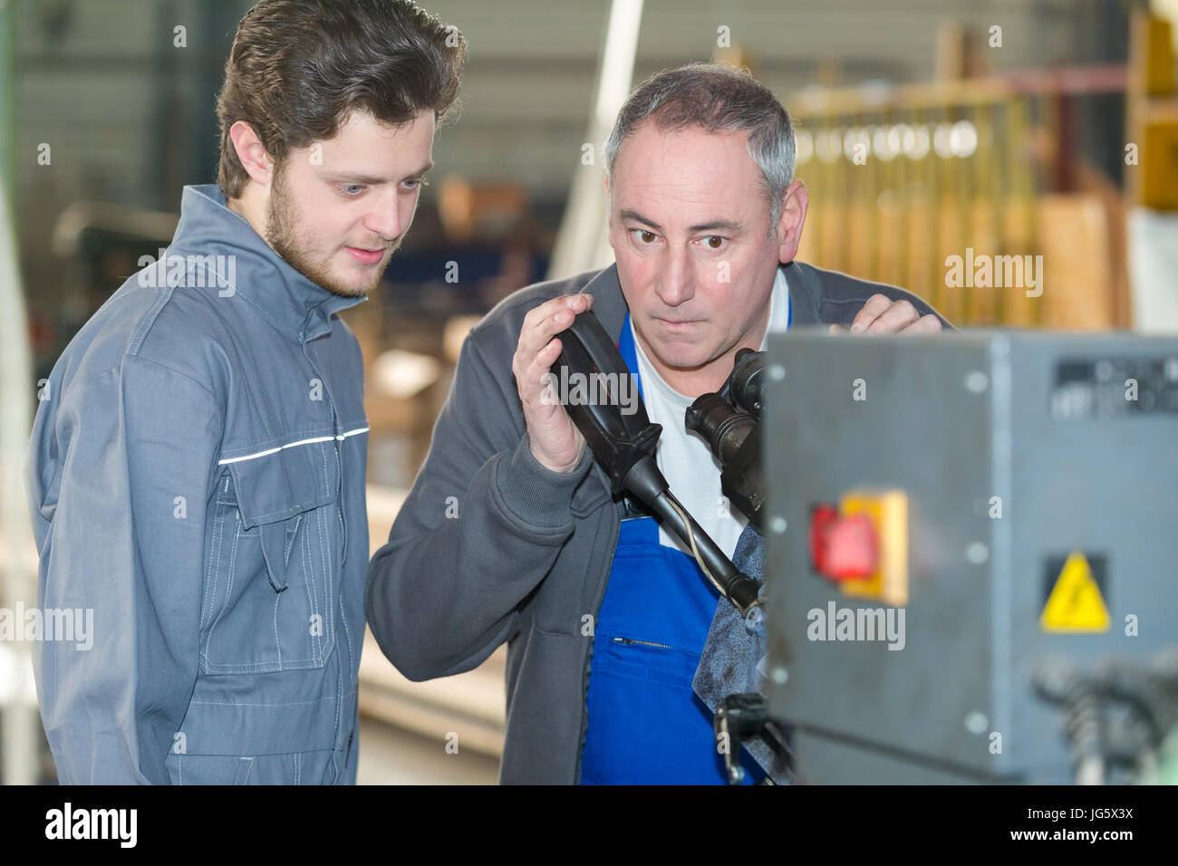 machine industrial operator Stock Photo - Alamy
