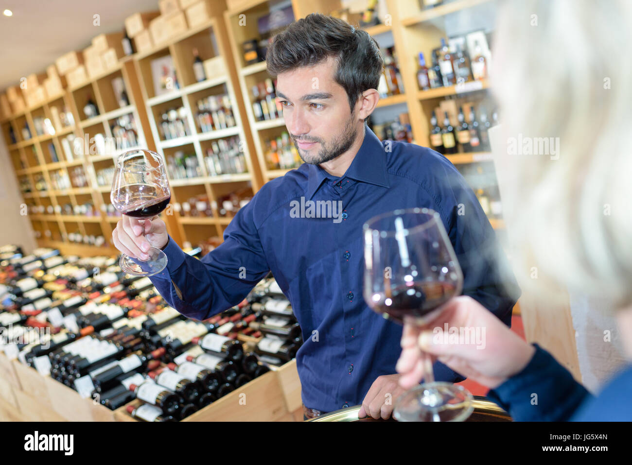 sommelier and customer tasting a wine glass Stock Photo - Alamy