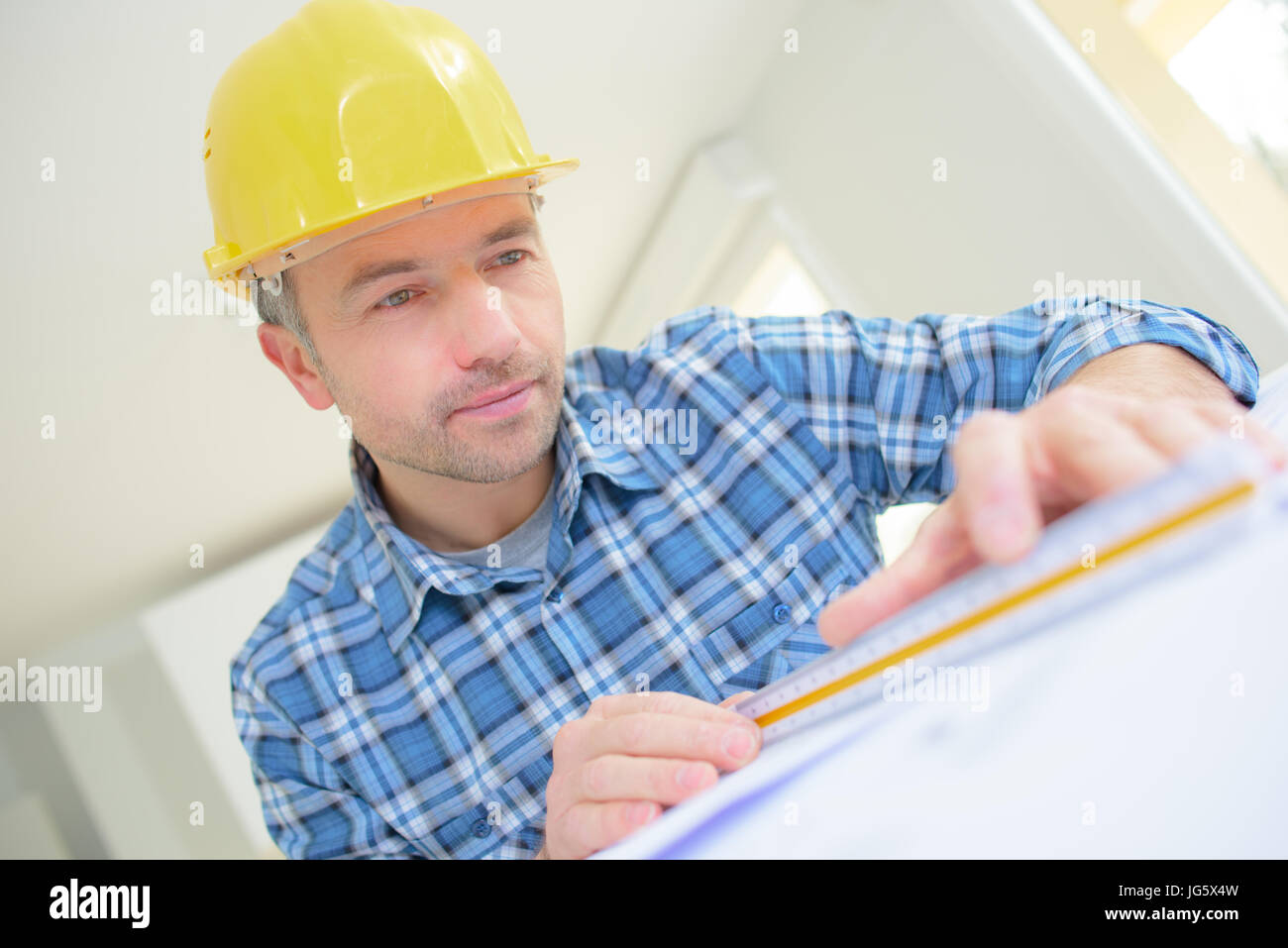 architect with compass measuring living house blueprint Stock Photo - Alamy
