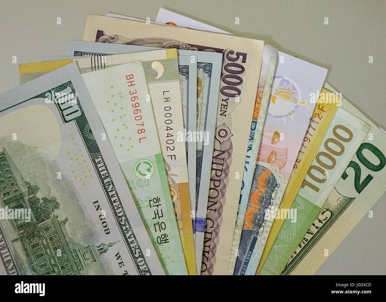 Many kind of banknotes - close up. Silver background Stock Photo - Alamy