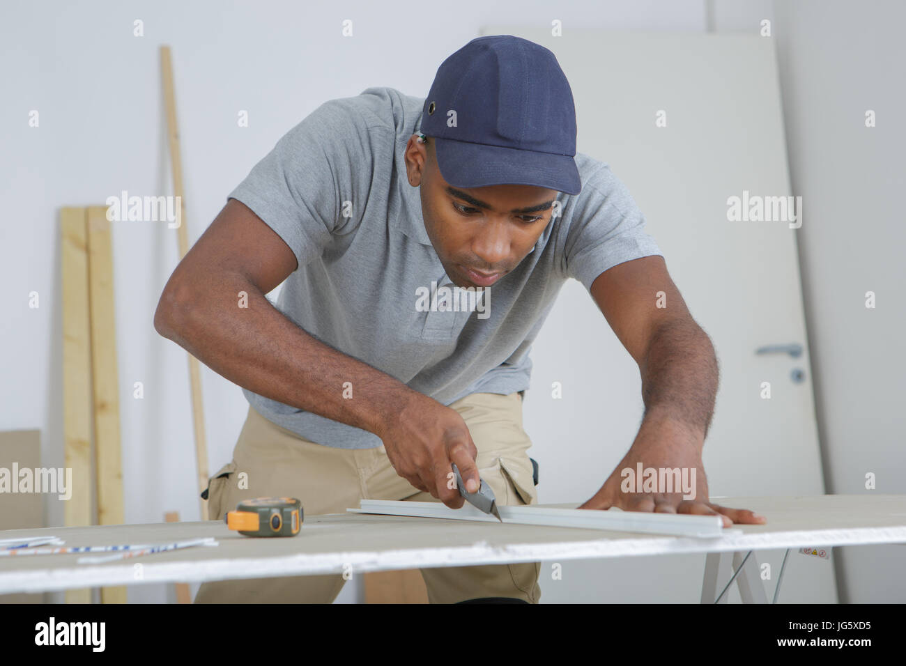 worker on wood cutters at workroom Stock Photo - Alamy
