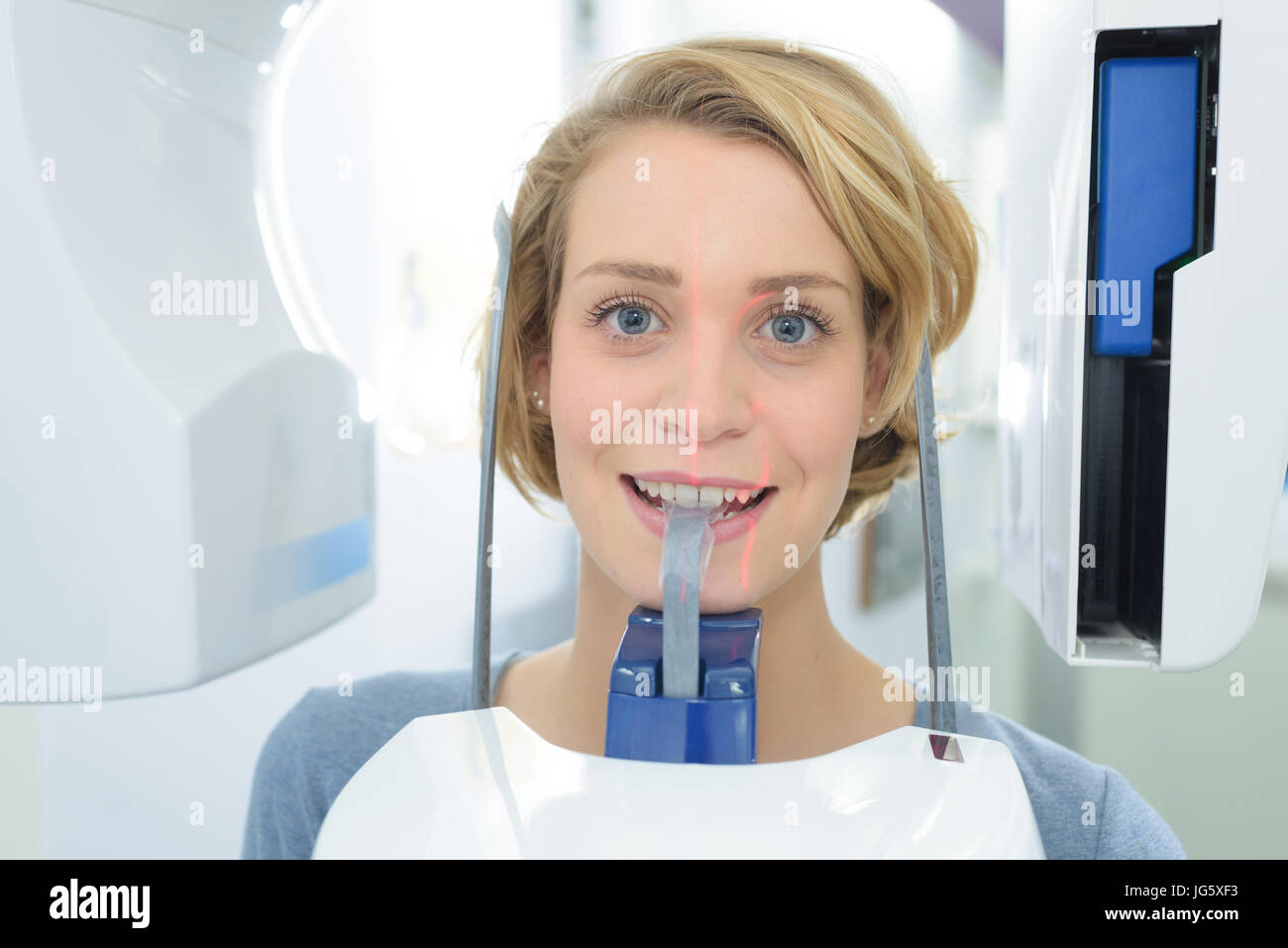Open mouth during dental treatment hi-res stock photography and images - Alamy