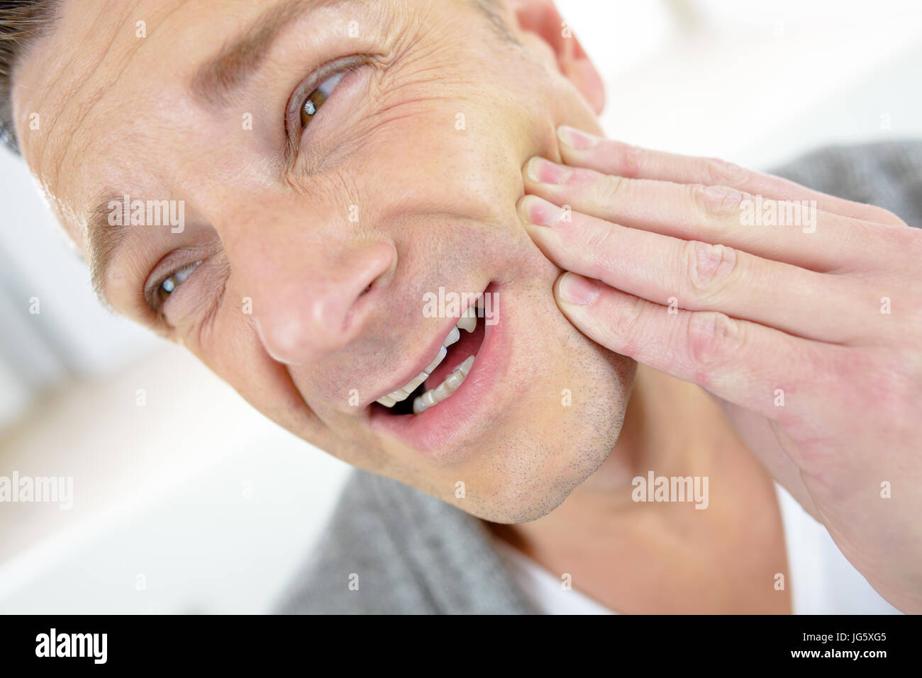 man in depression with tooth pain Stock Photo - Alamy