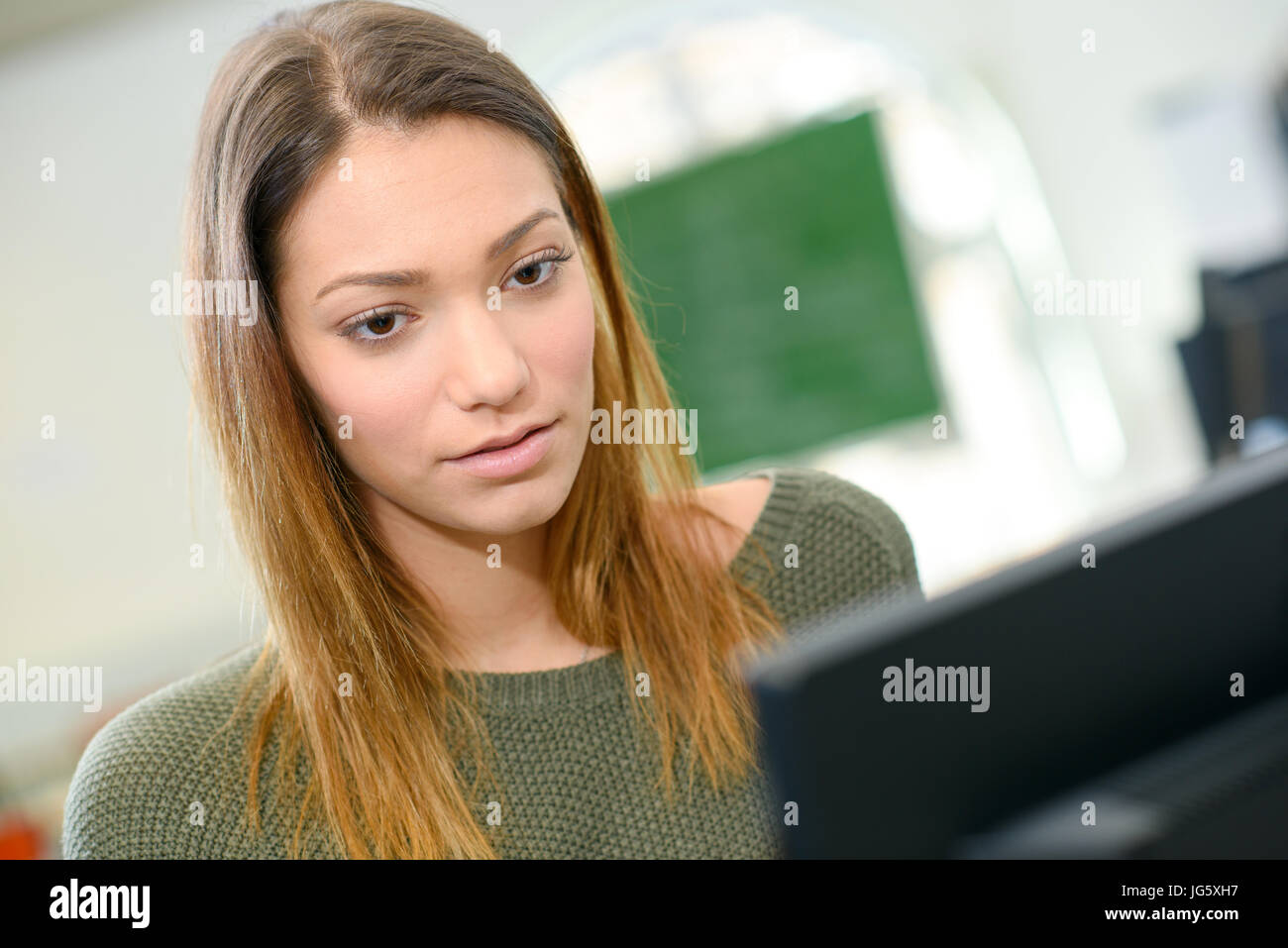 concentrated student working on computer at university Stock Photo - Alamy